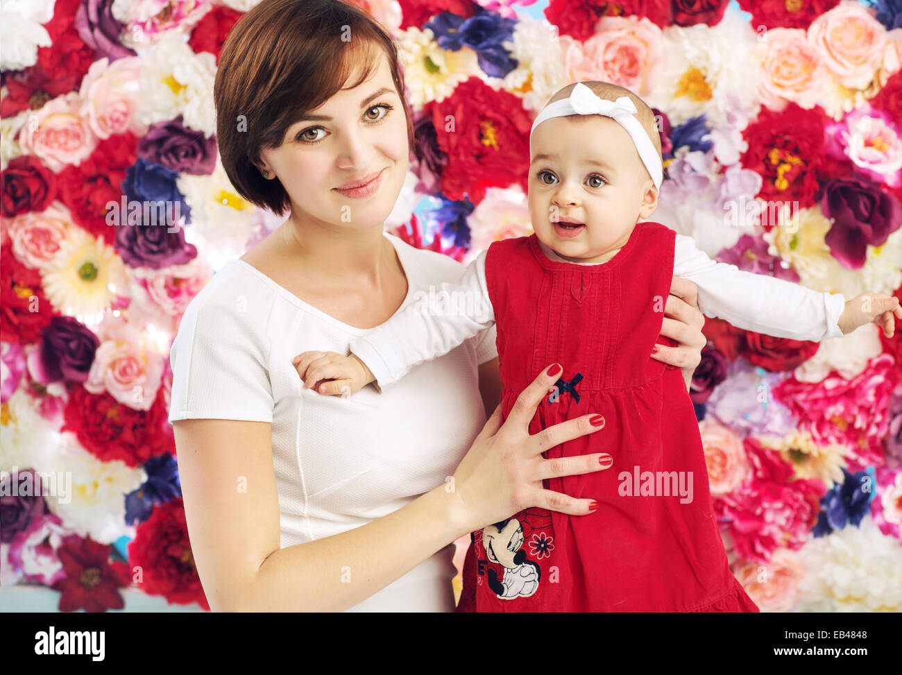 Pretty mom with cute baby Stock Photo - Alamy