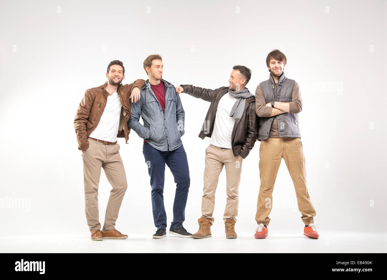 Group of smart guys advertising clothes Stock Photo - Alamy