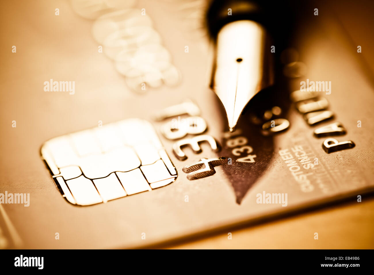 Credit card and pen Stock Photo - Alamy
