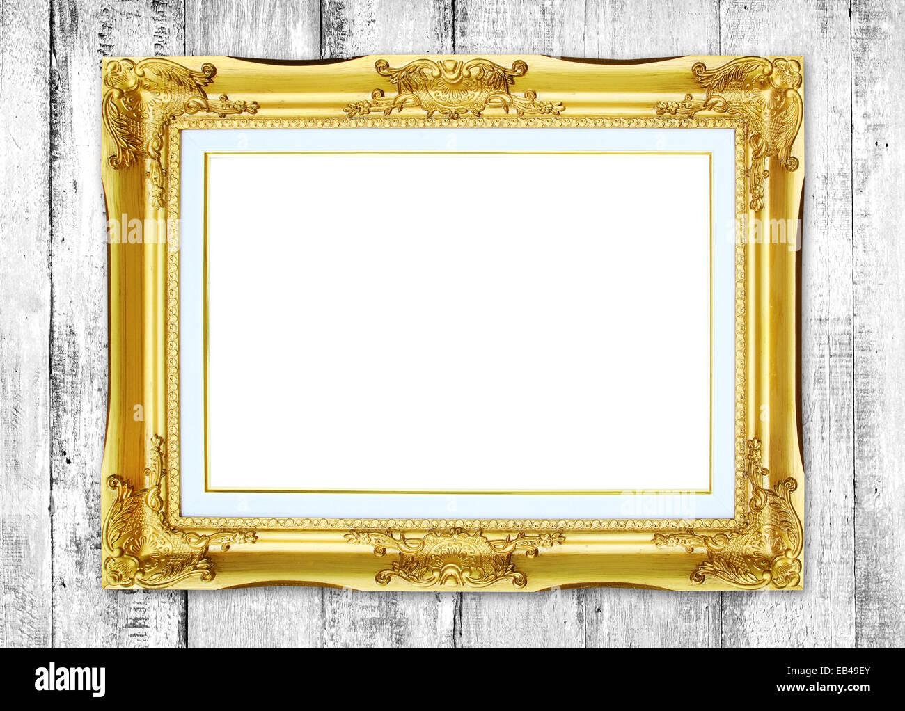 blank golden frame on wood wall background Stock Photo - Alamy