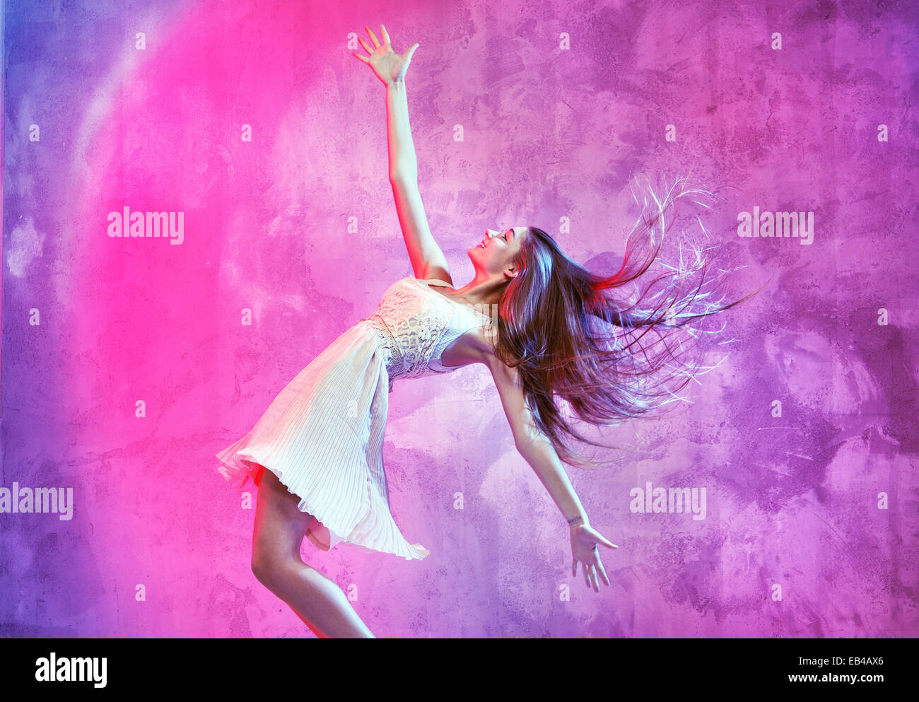 Smiling young dancer on the dance floor Stock Photo - Alamy