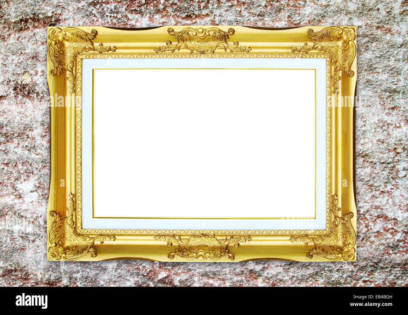 blank golden frame on ancient stone wall background Stock Photo - Alamy