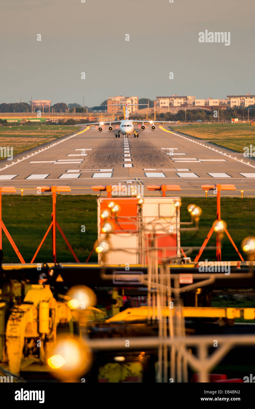 Jet plane taking off from the runway of City Airport, London Stock ...
