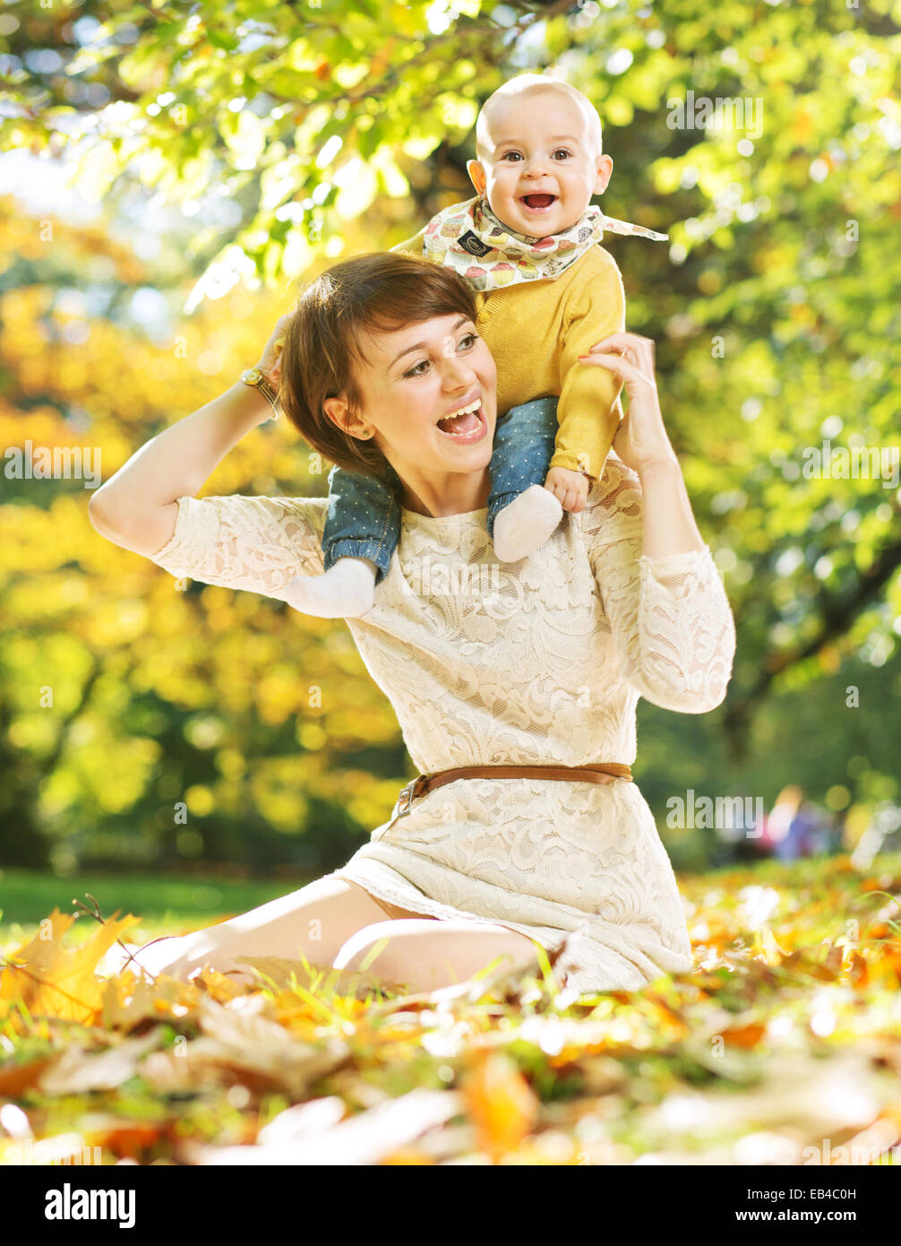 Laughing mother and cute daughter Stock Photo - Alamy