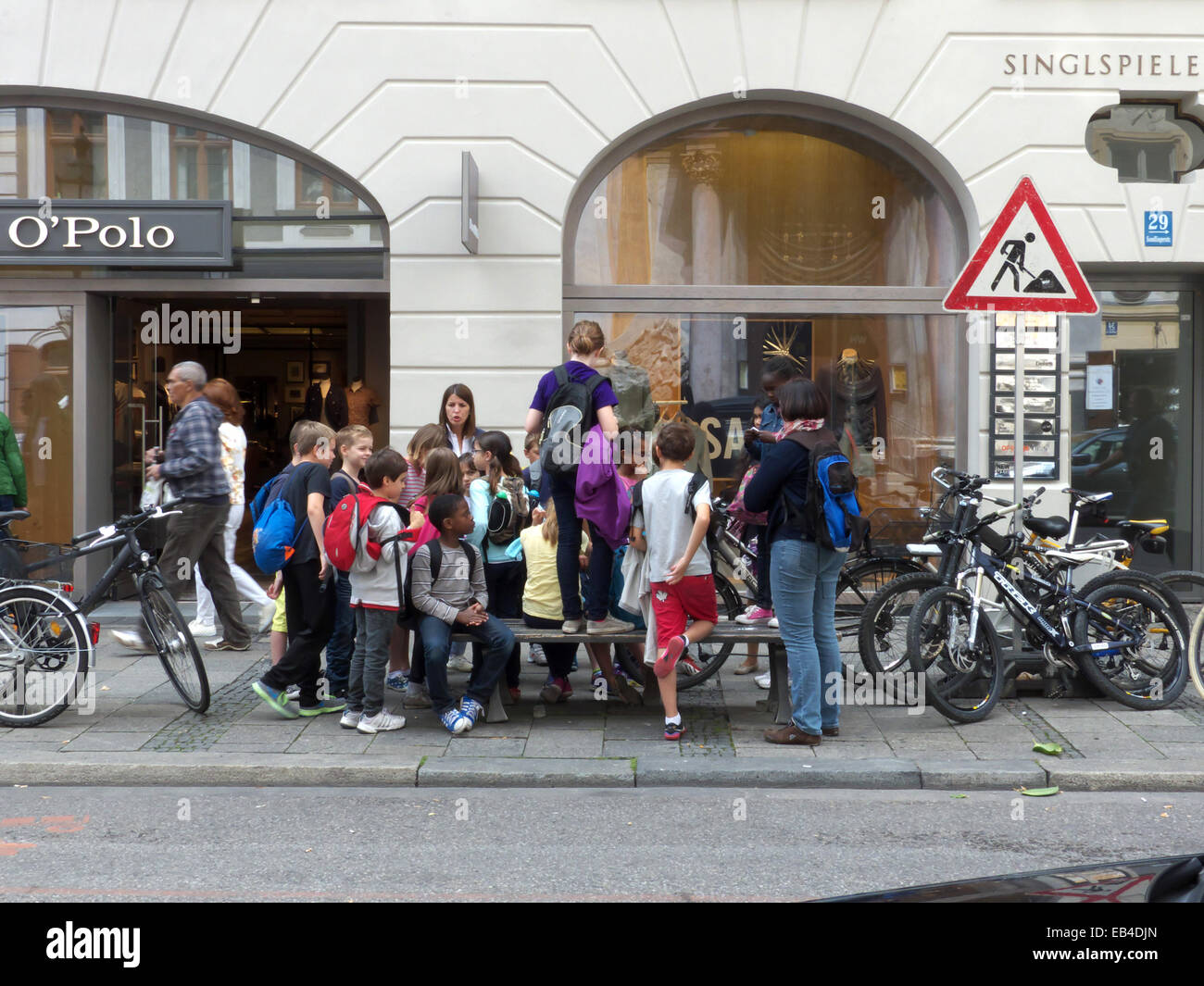 School Kids with teachers having a outing in Munich old town Germany ...