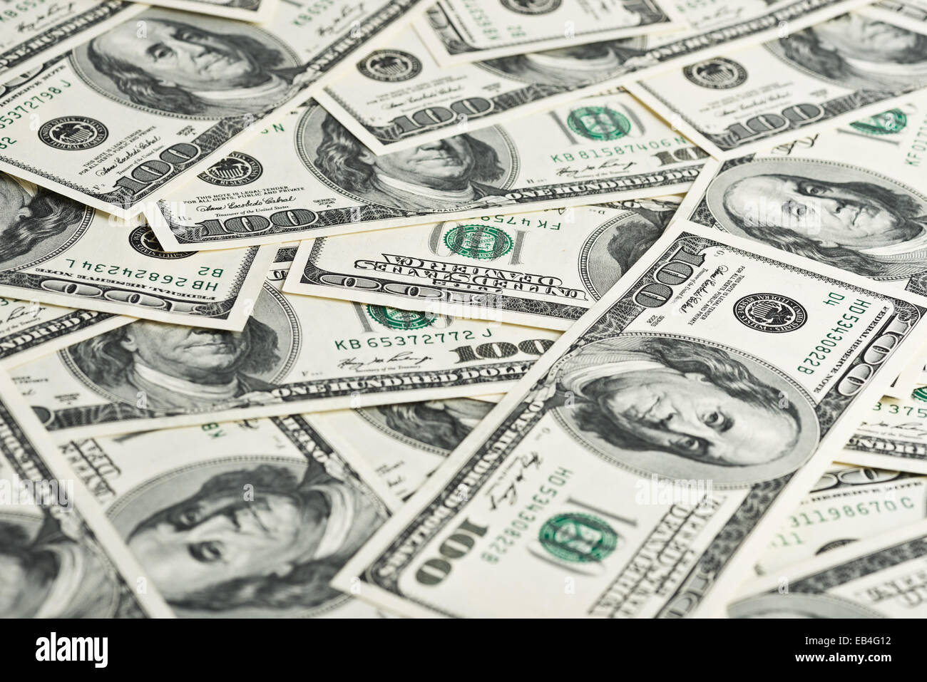 One hundred dollars pile as background Stock Photo - Alamy