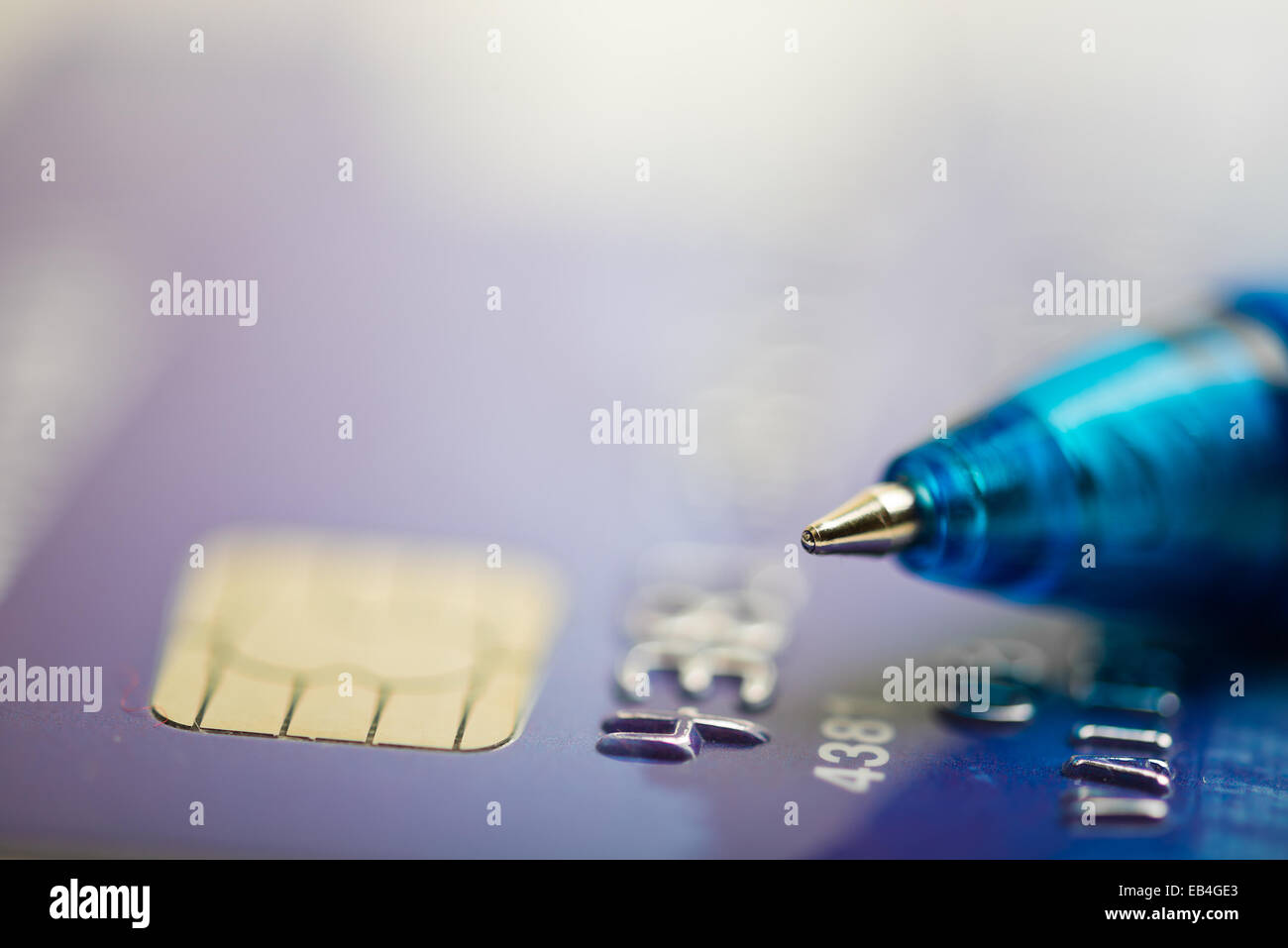 Credit card and pen Stock Photo - Alamy