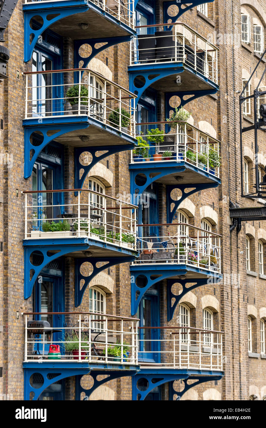 Balconies of converted warehouse flats in Shad Thames, Dockland Stock ...