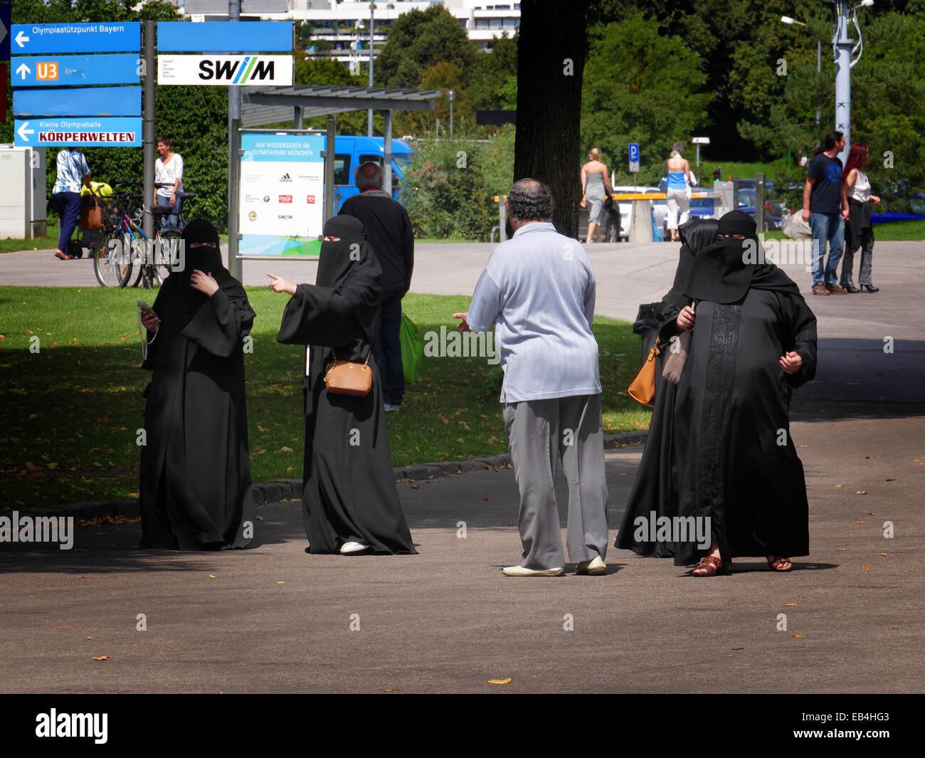 Arab Saudi Arabian Women tourists in traditional black Burka in Olympia ...