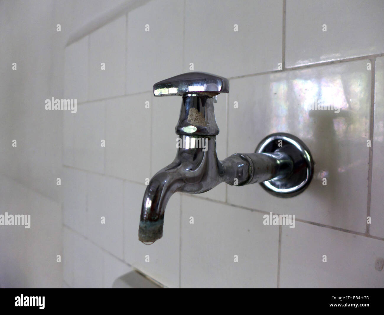 Water tap with drop of water Stock Photo - Alamy
