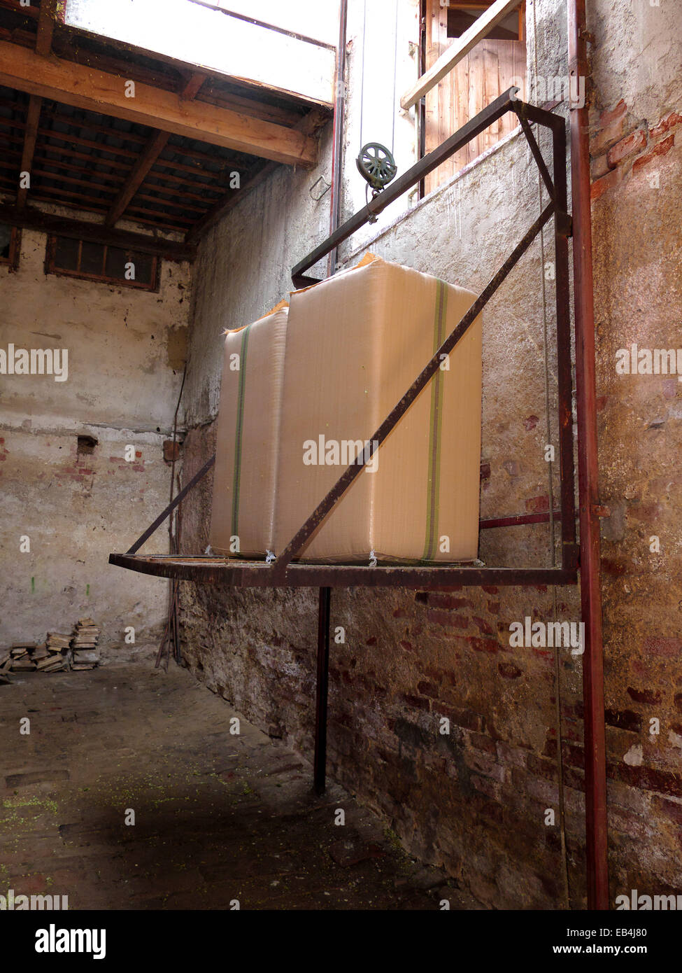 Germany Bavaria Hallertau Hops packed in big bag ready to be lifted up ...