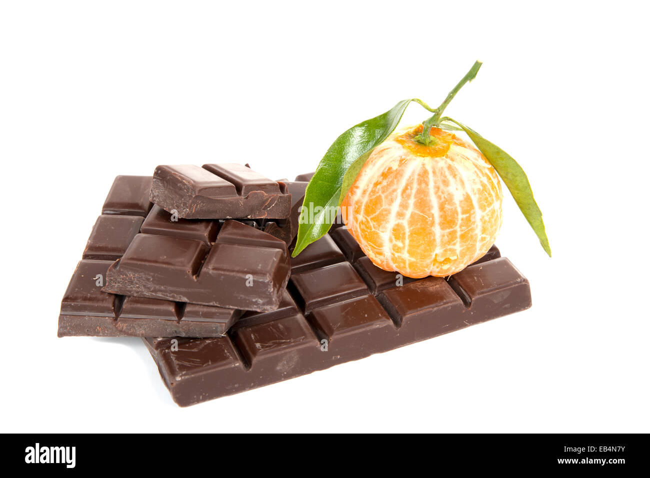 mandarin and chocolate tablet on white background Stock Photo - Alamy