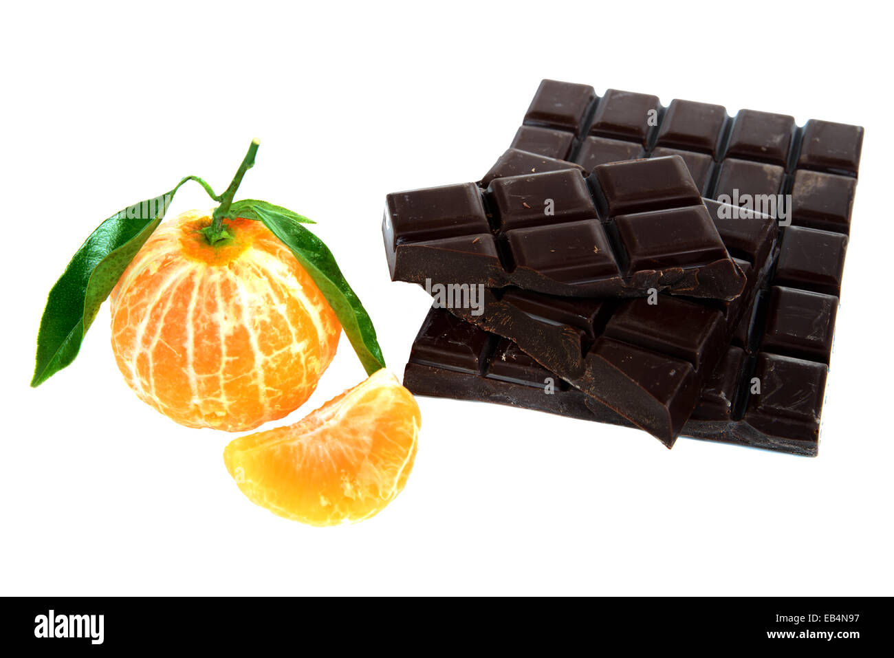mandarin and chocolate tablet on white background Stock Photo - Alamy