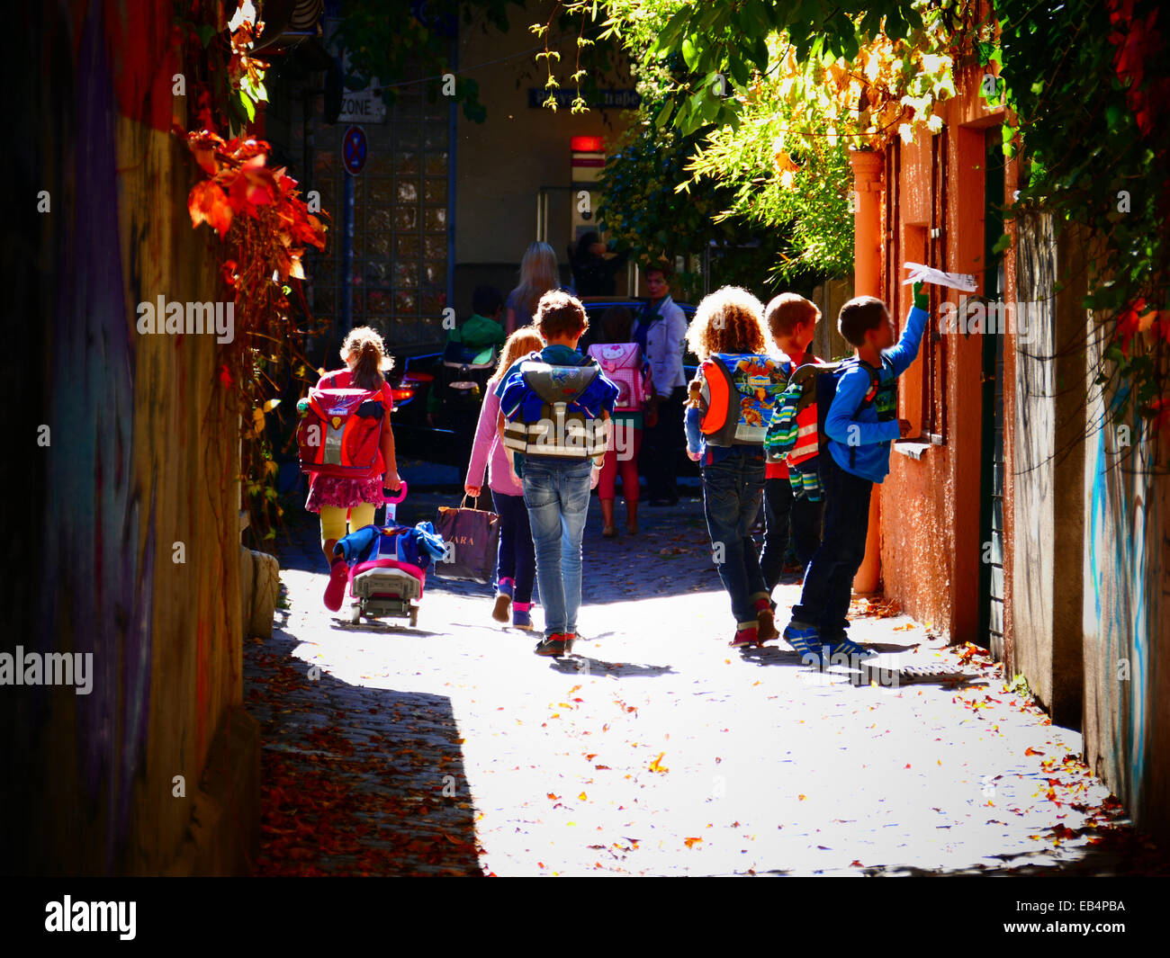 After School Children Kids going home in Autumn leaves color Stock ...