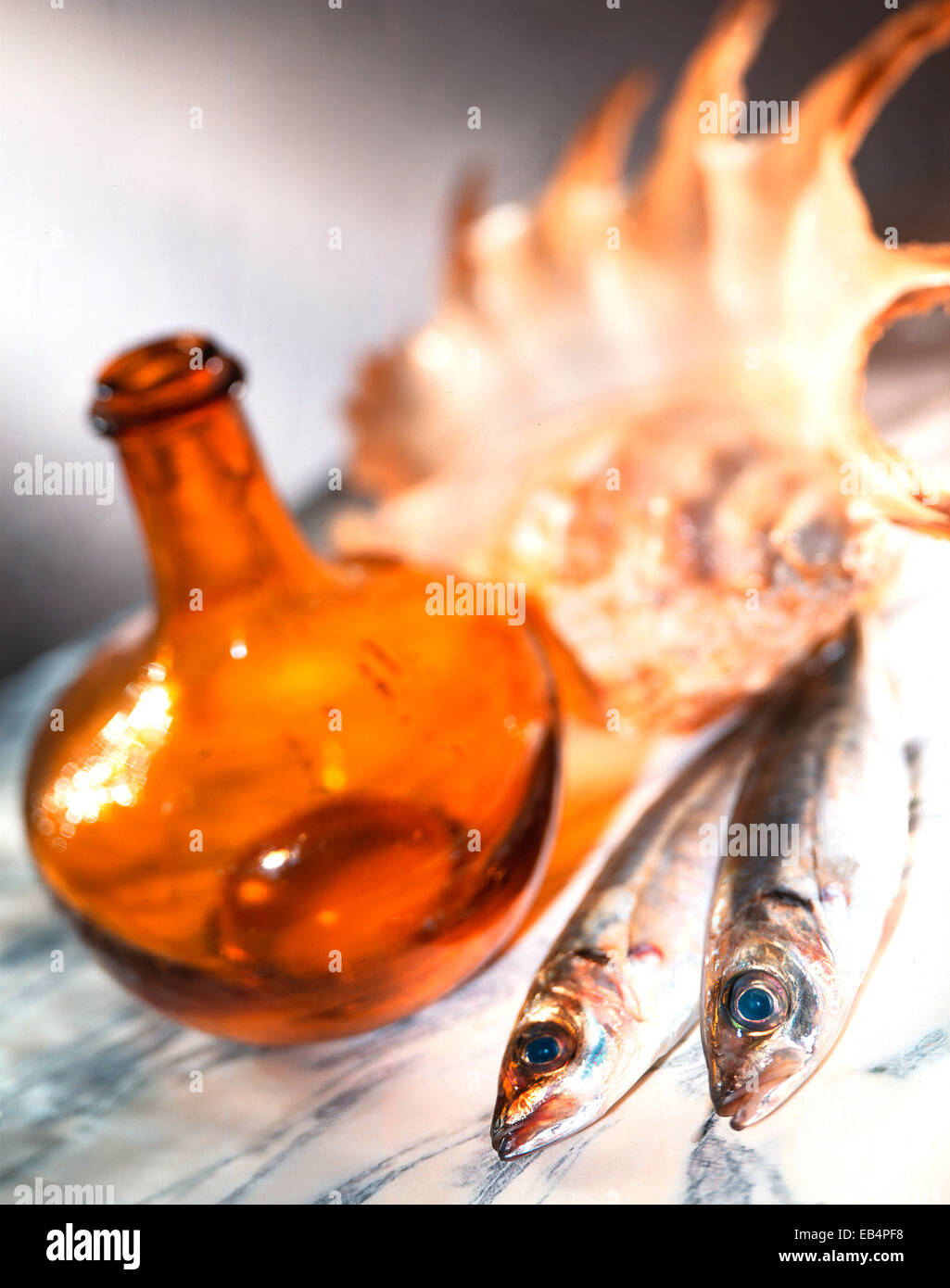 still-life with fish and bottle Stock Photo - Alamy