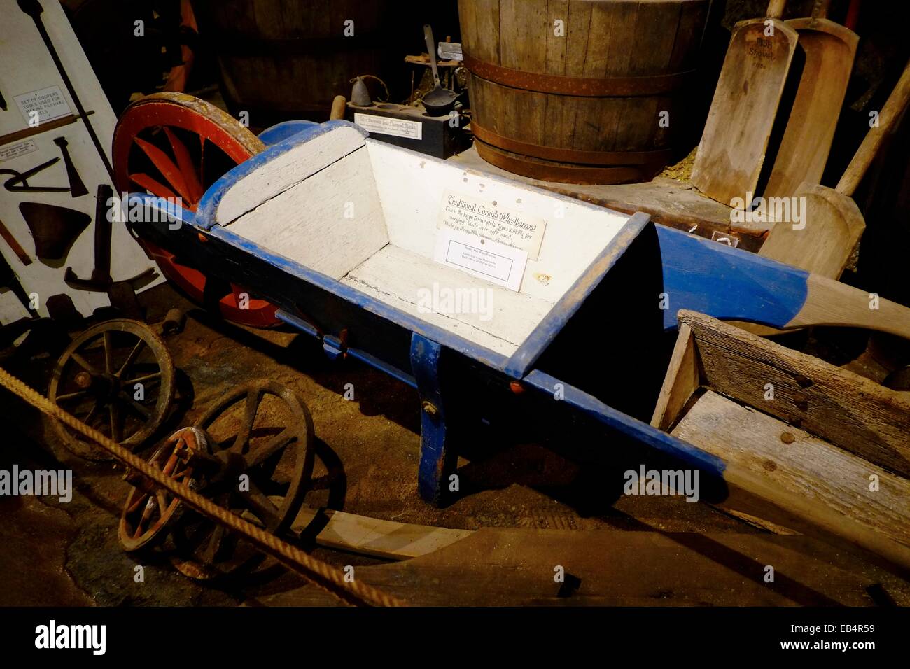 Traditional cornish wheelbarrow on display inside the Mevagissey Museum ...
