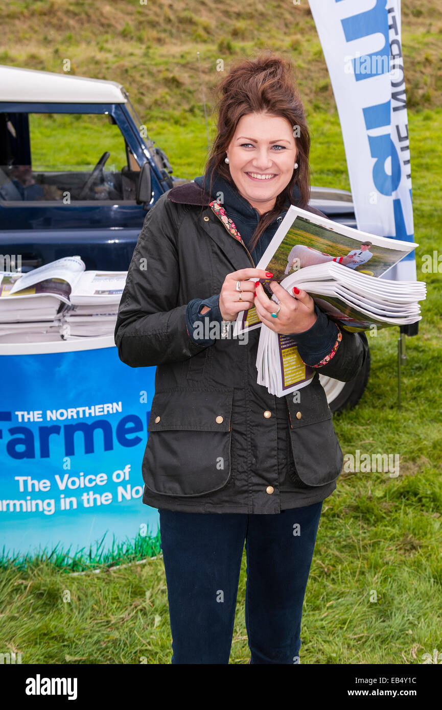 Girl handing out papers hi-res stock photography and images - Alamy