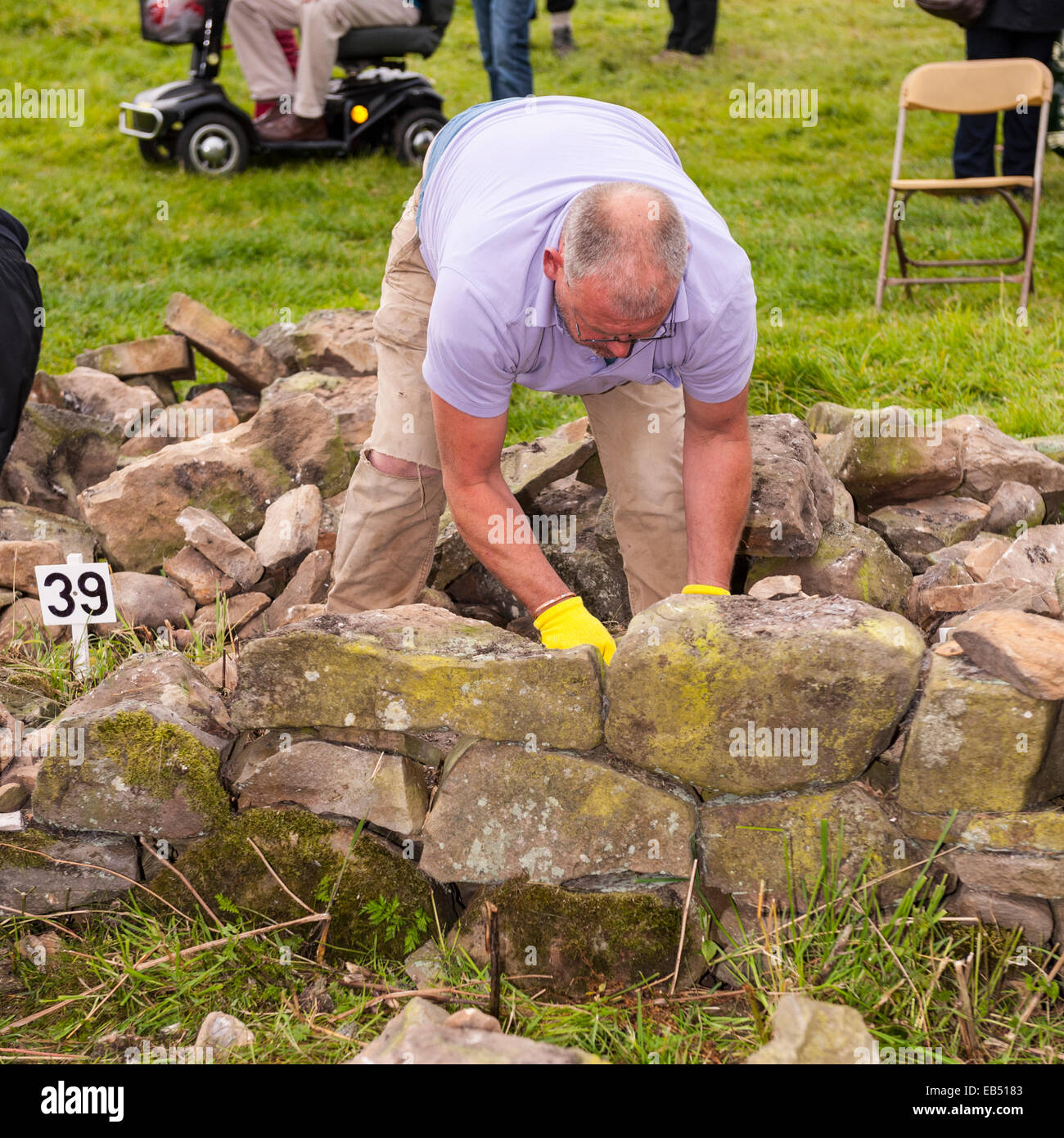 Fixing a drystone wall hi-res stock photography and images - Alamy