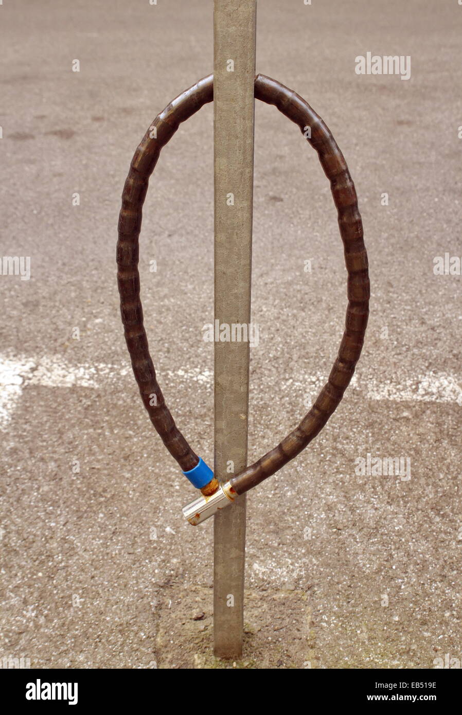 Close up on big padlock hanging on a metallic post in the street Stock ...