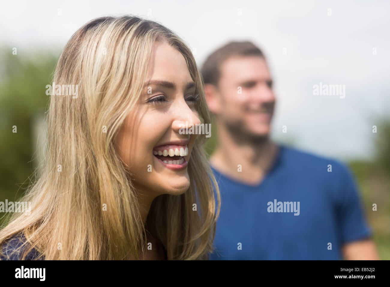 Cute couple smiling and laughing Stock Photo - Alamy