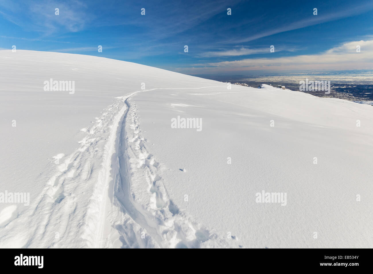 Back country ski tracks in powder snow with majestic aerial view in a ...
