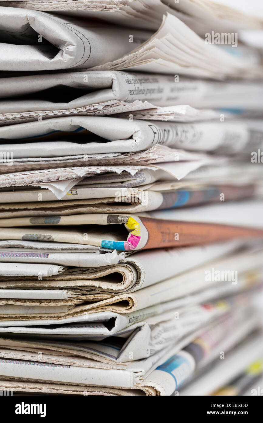 Stack of newspapers Stock Photo - Alamy