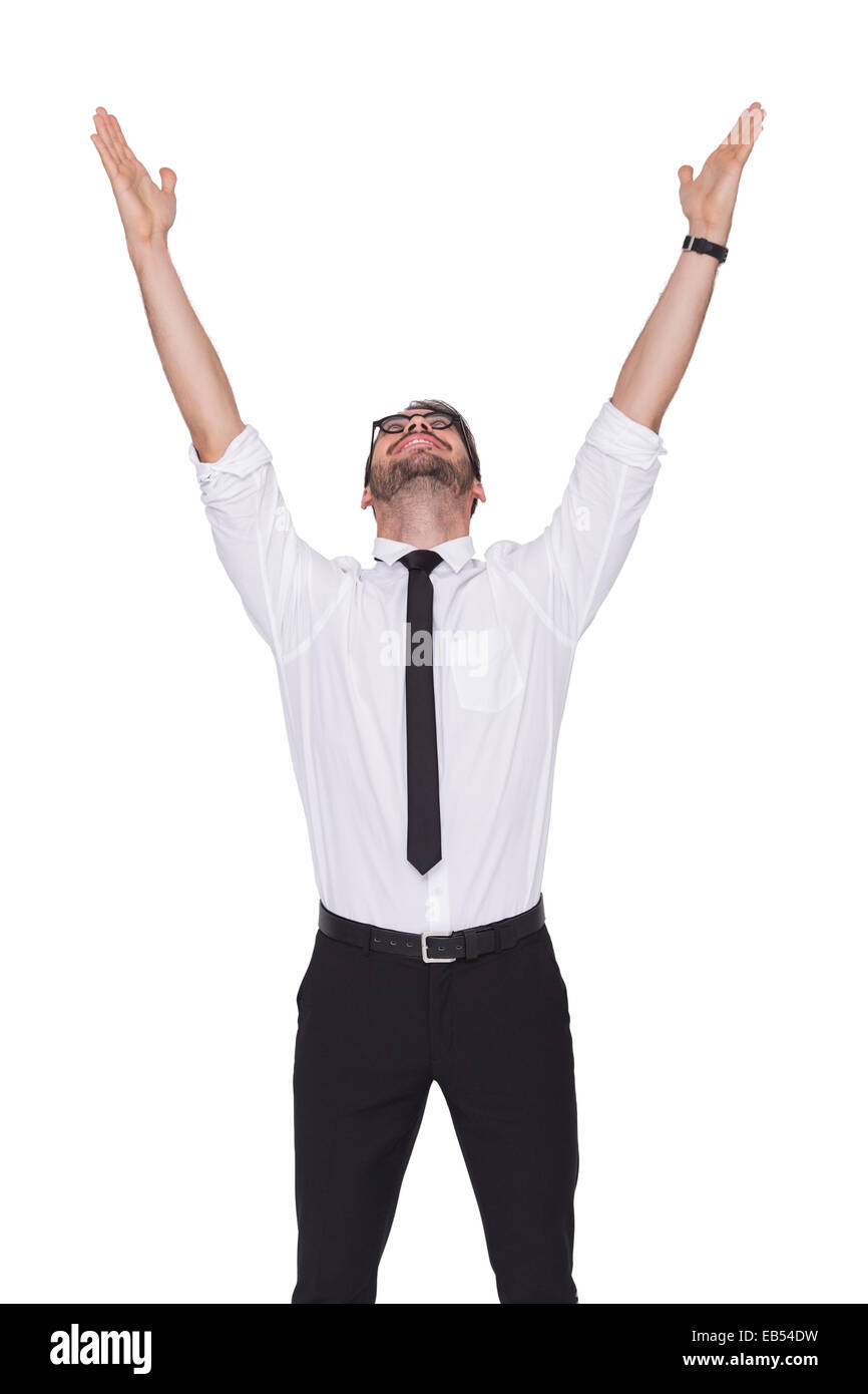 Smiling businessman cheering with his hands up Stock Photo - Alamy