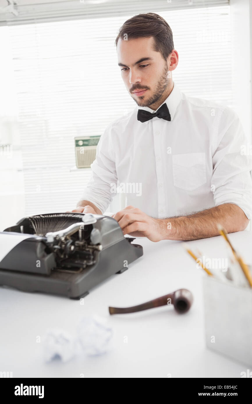 Hipster businessman using a typewriter Stock Photo - Alamy