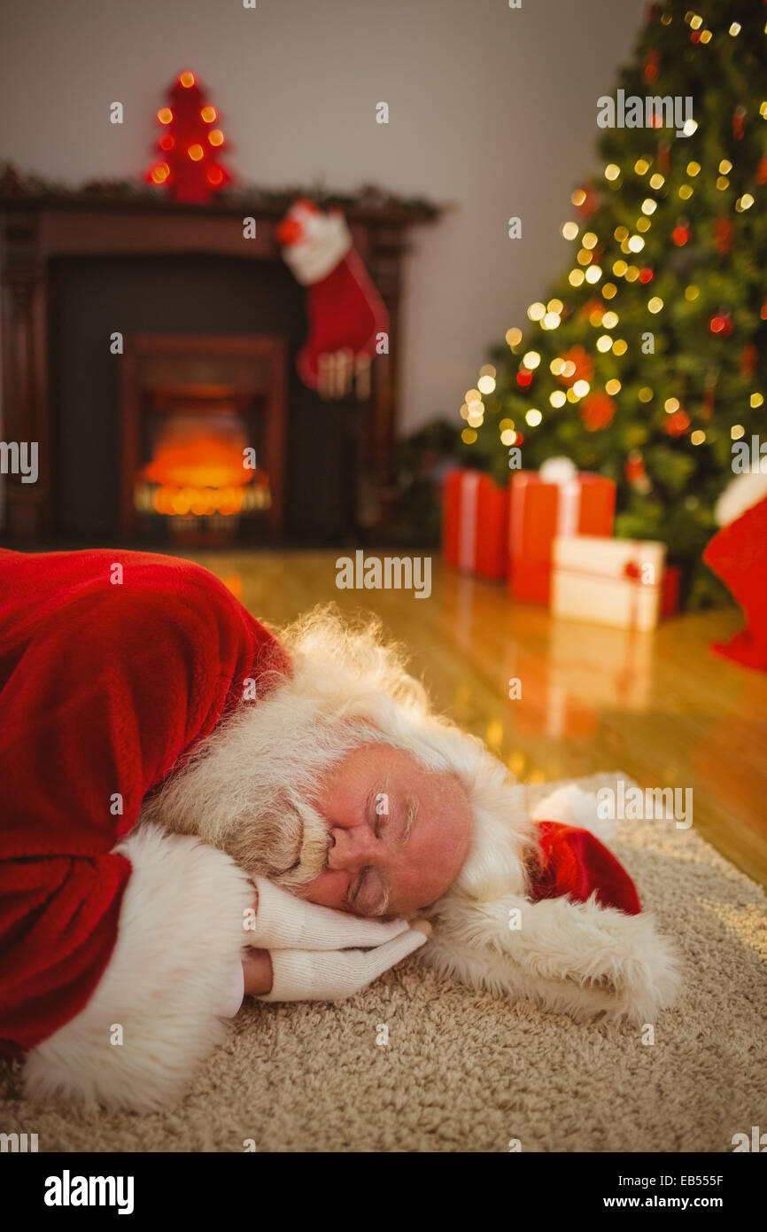 Santa asleep fireplace hi-res stock photography and images - Alamy