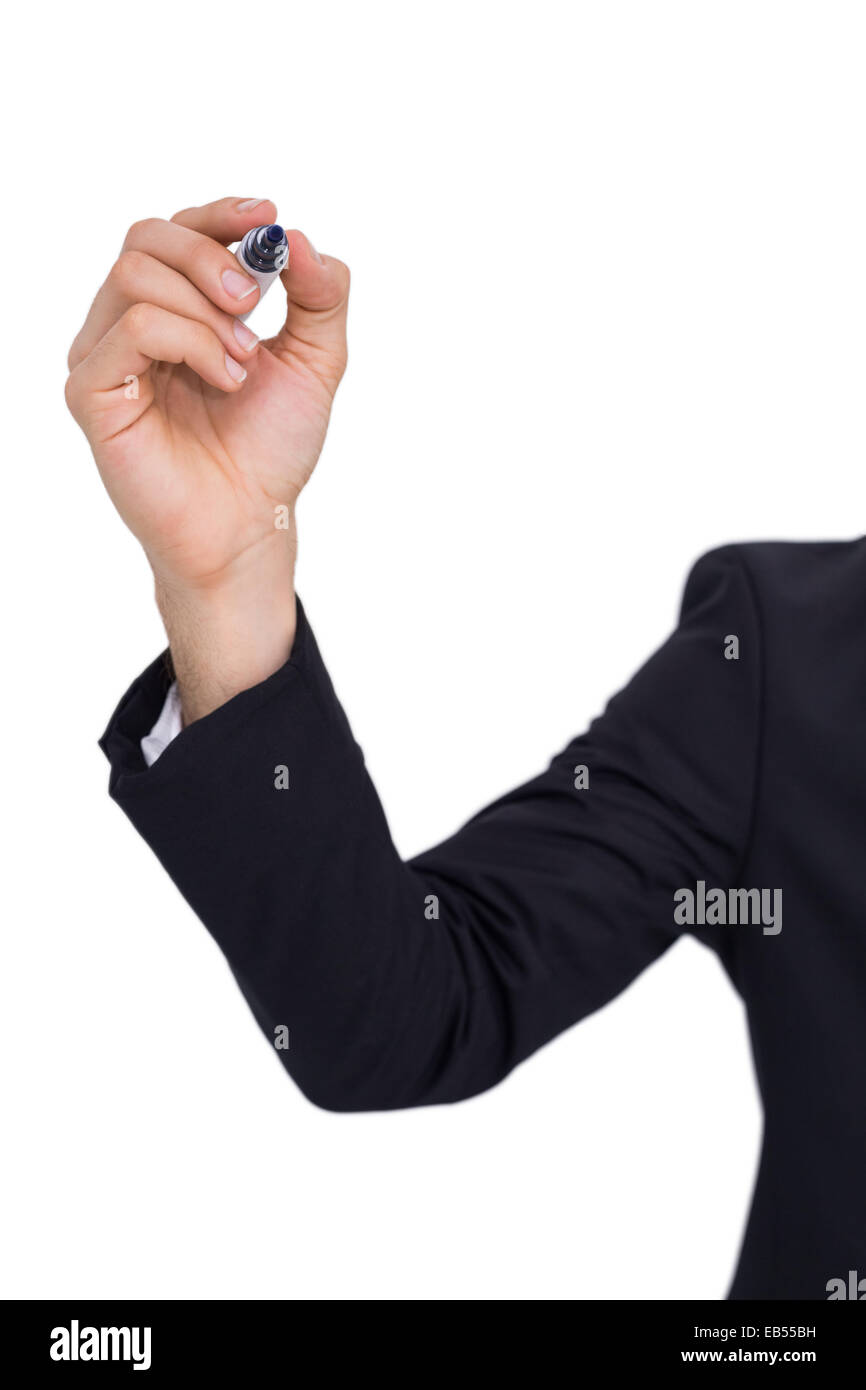 Businessman writing with black marker Stock Photo - Alamy