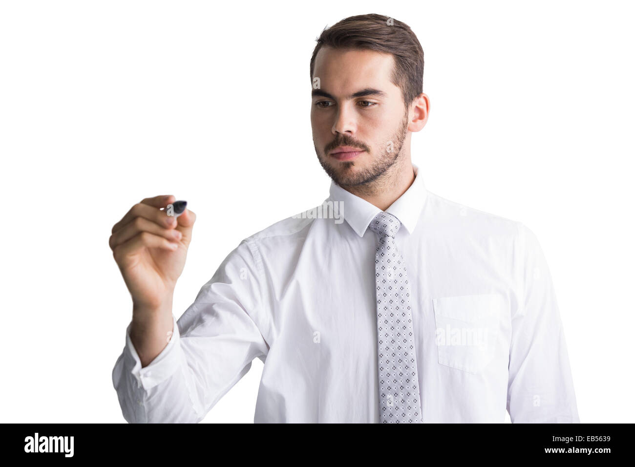 Cheerful businessman writing with marker Stock Photo - Alamy
