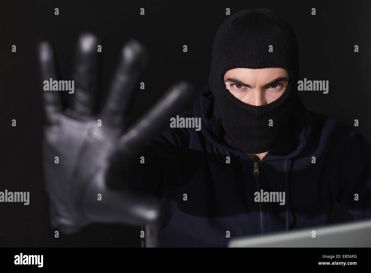 Hacker computer wearing balaclava hi-res stock photography and images ...