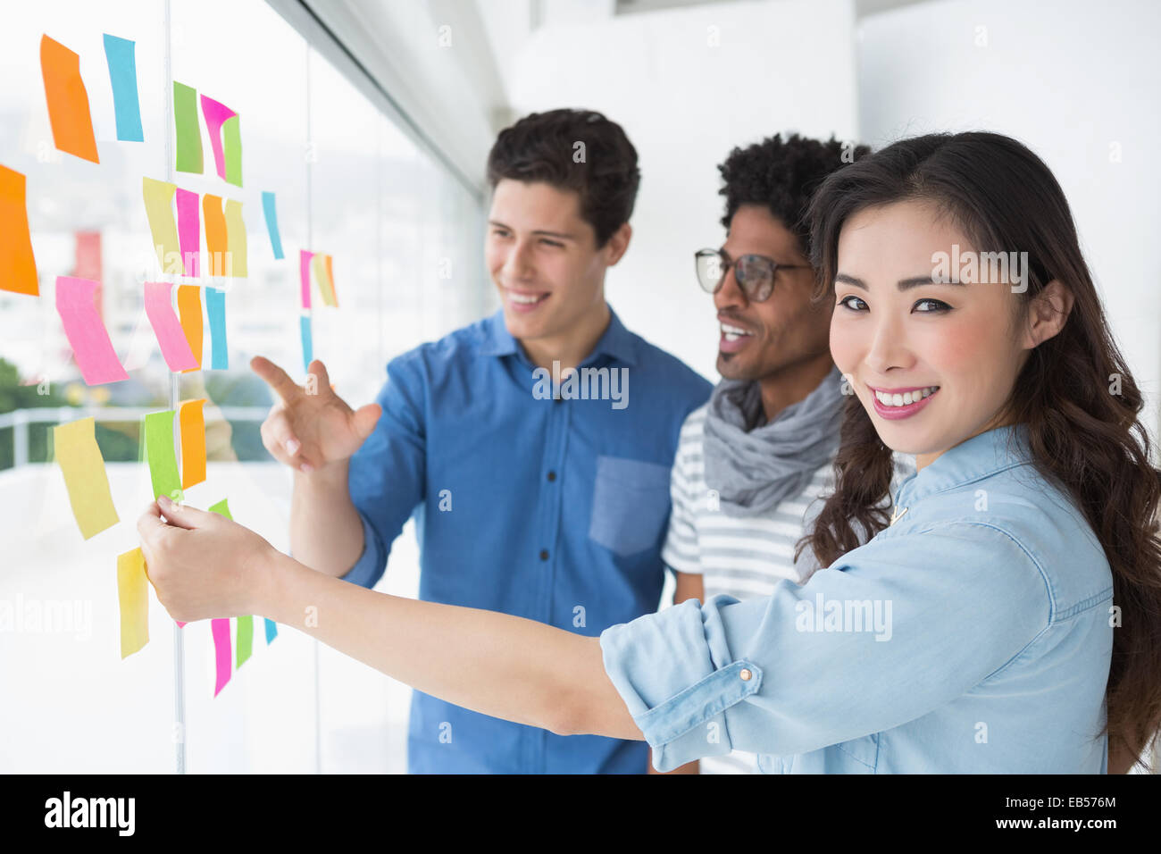 Young creative team brainstorming together Stock Photo - Alamy