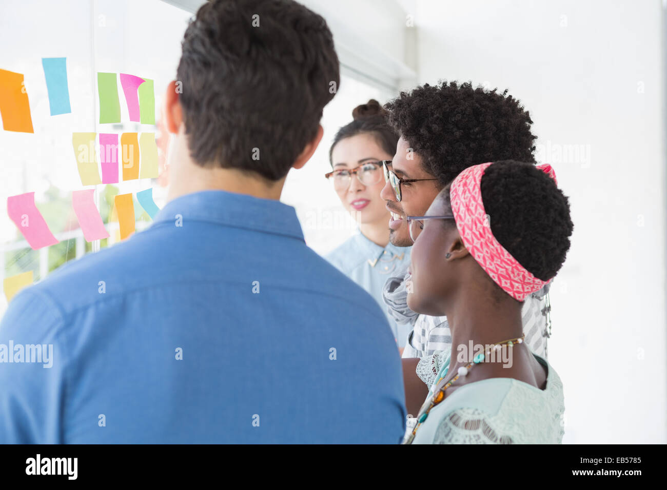 Young creative team brainstorming together Stock Photo - Alamy
