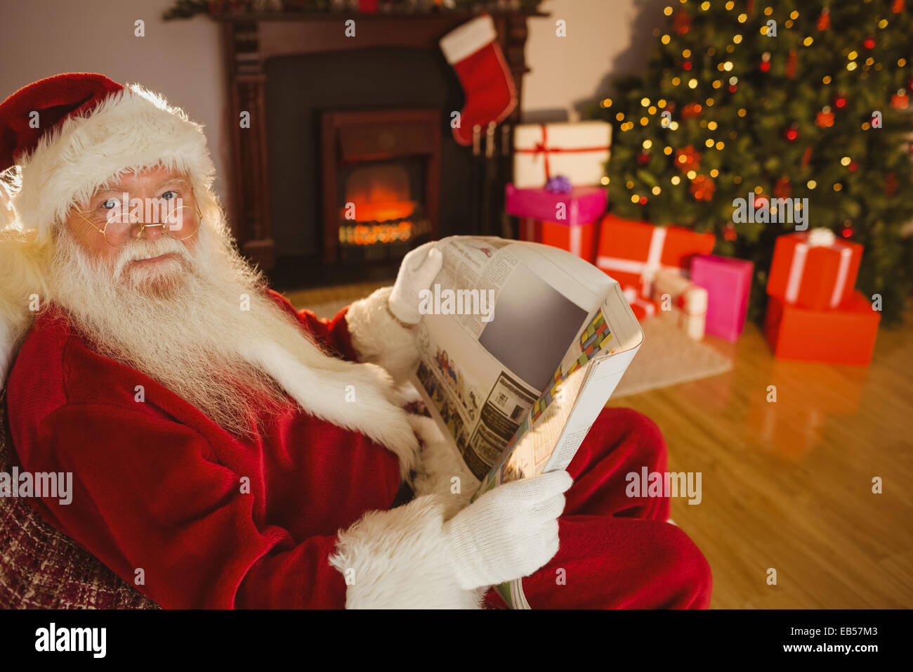 Santa claus with newspaper hi-res stock photography and images - Alamy