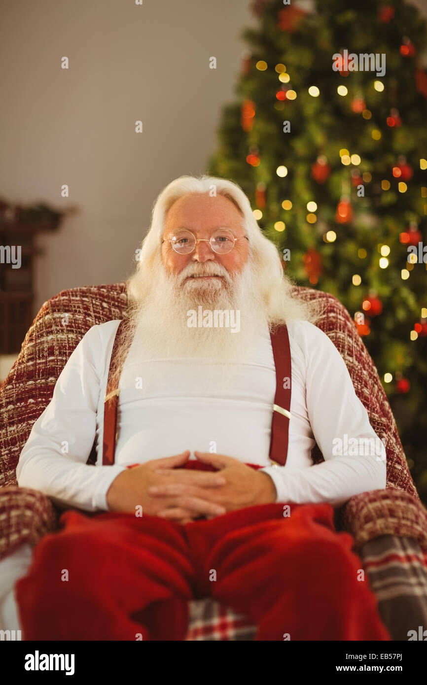 Smiling santa without jacket relaxing hi-res stock photography and ...