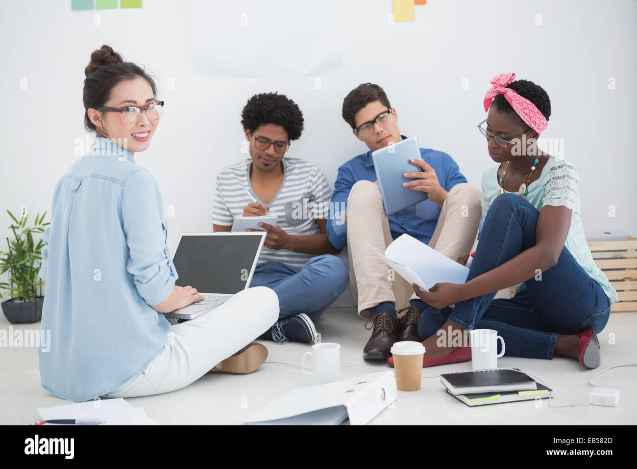 Young creative team brainstorming together Stock Photo - Alamy