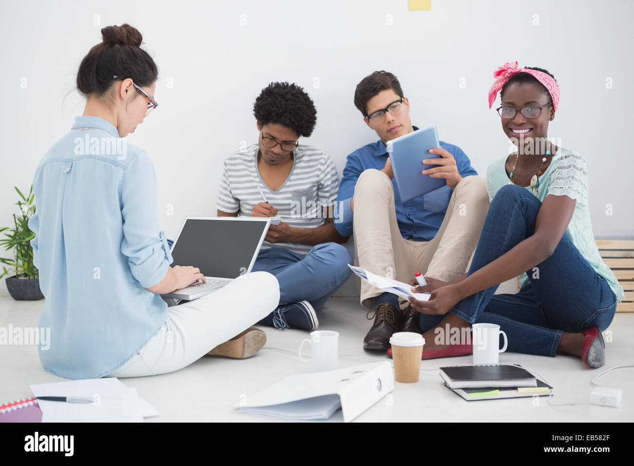 Young creative team brainstorming together Stock Photo - Alamy