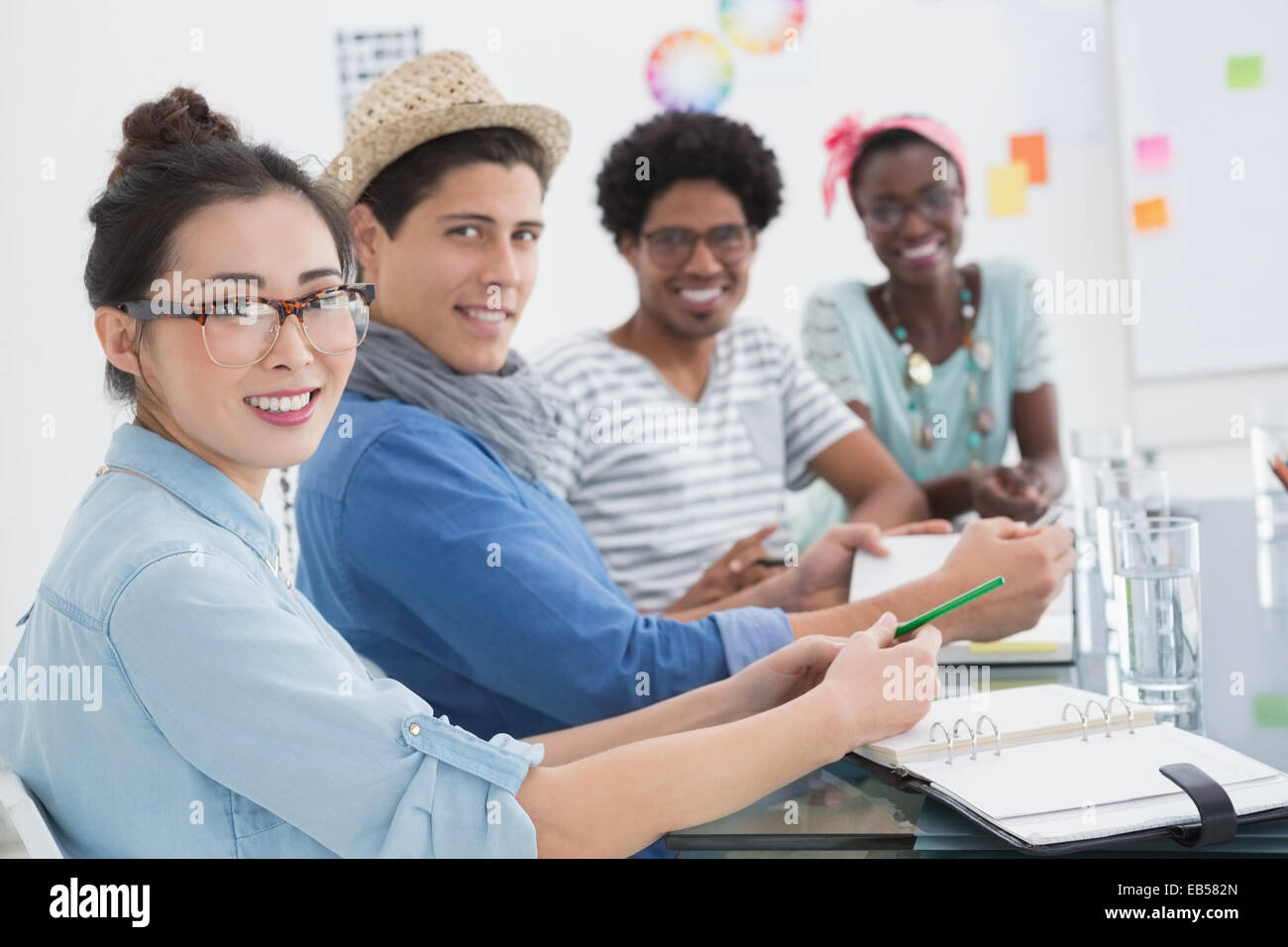 Young creative team having a meeting Stock Photo - Alamy