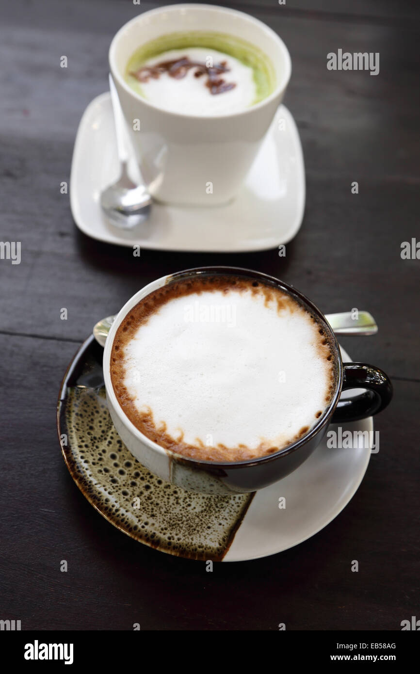 cup of hot coffee with green tea background Stock Photo - Alamy