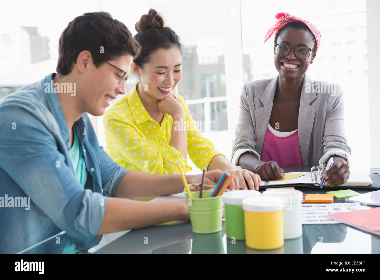 Young creative team having a meeting Stock Photo - Alamy