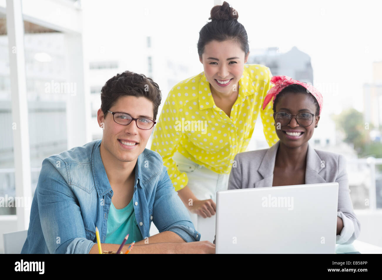 Young creative team having a meeting Stock Photo - Alamy