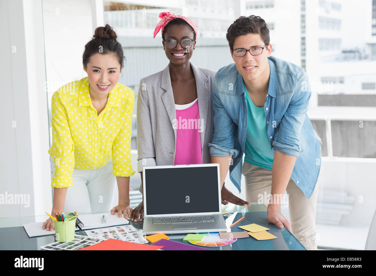 Young creative team having a meeting Stock Photo - Alamy