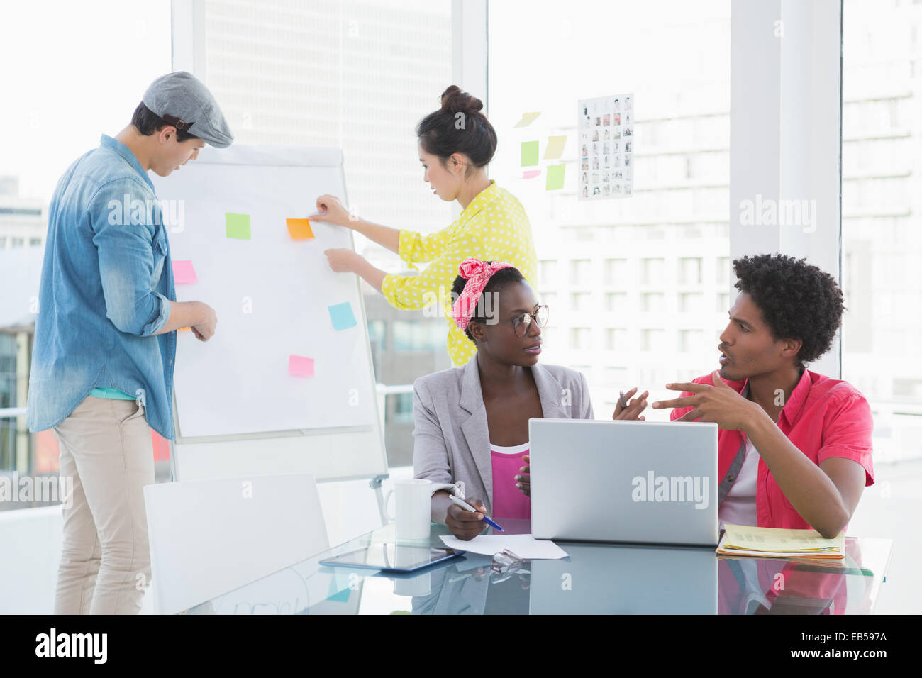 Young creative team having a meeting Stock Photo - Alamy