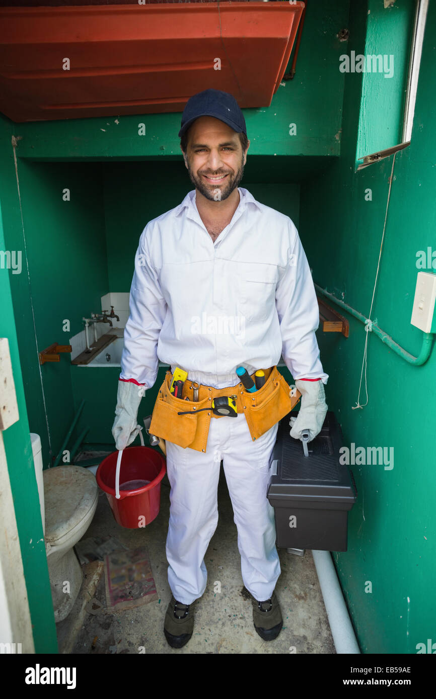 Construction worker smiling at camera Stock Photo - Alamy