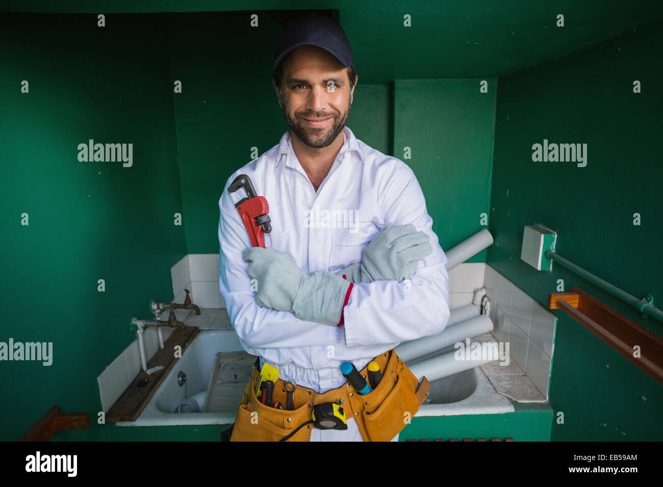 Construction worker smiling at camera Stock Photo - Alamy