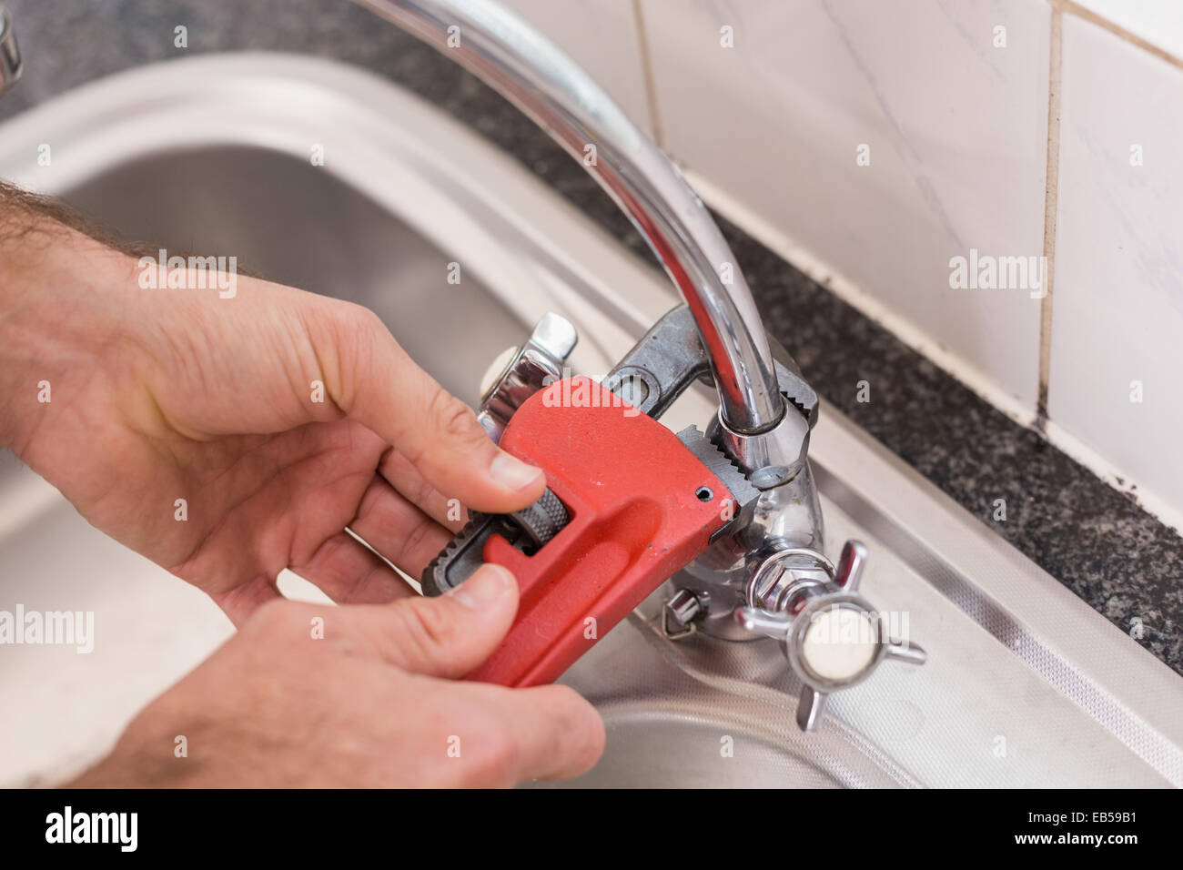 Fixing tap tool hi-res stock photography and images - Alamy