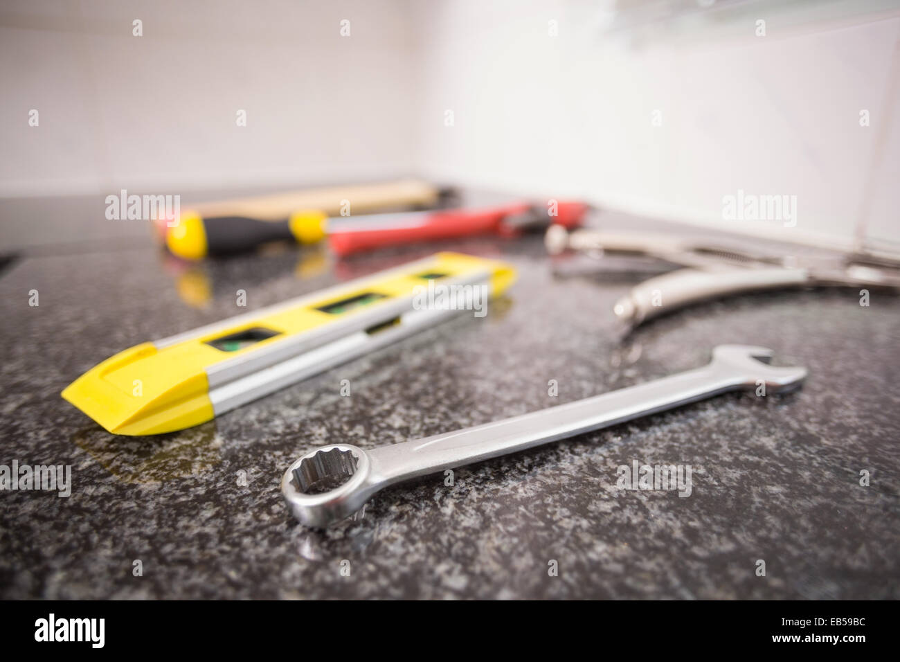 Plumbing tools on the counter Stock Photo - Alamy