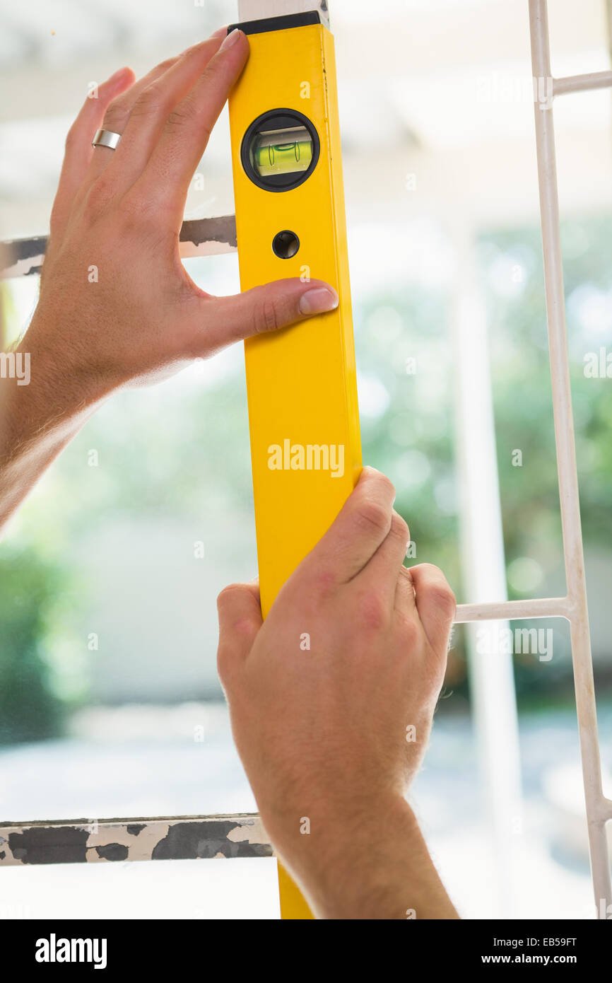 Construction using spirit level on hi-res stock photography and images ...