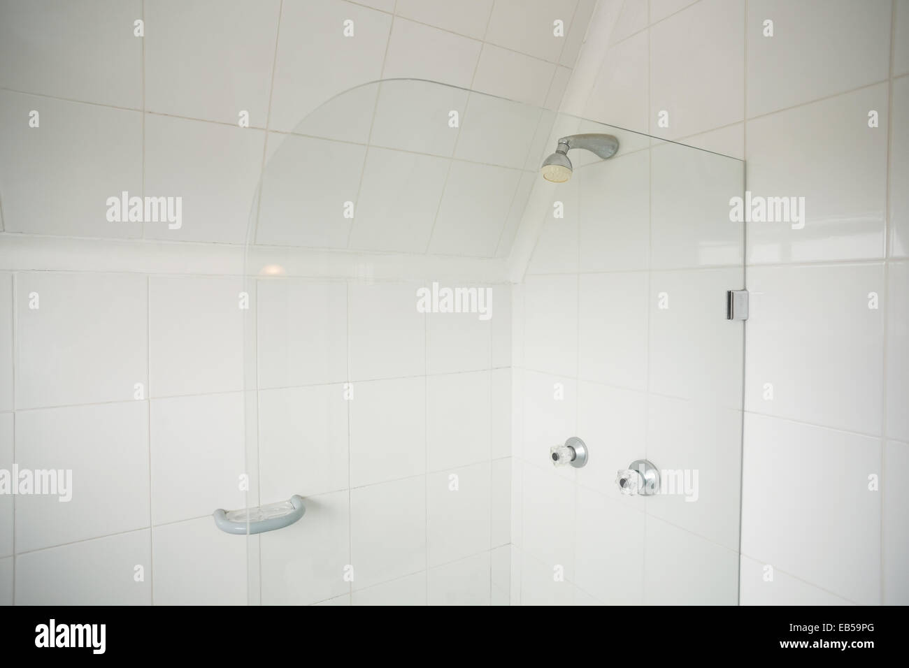 Shower with glass divide Stock Photo - Alamy